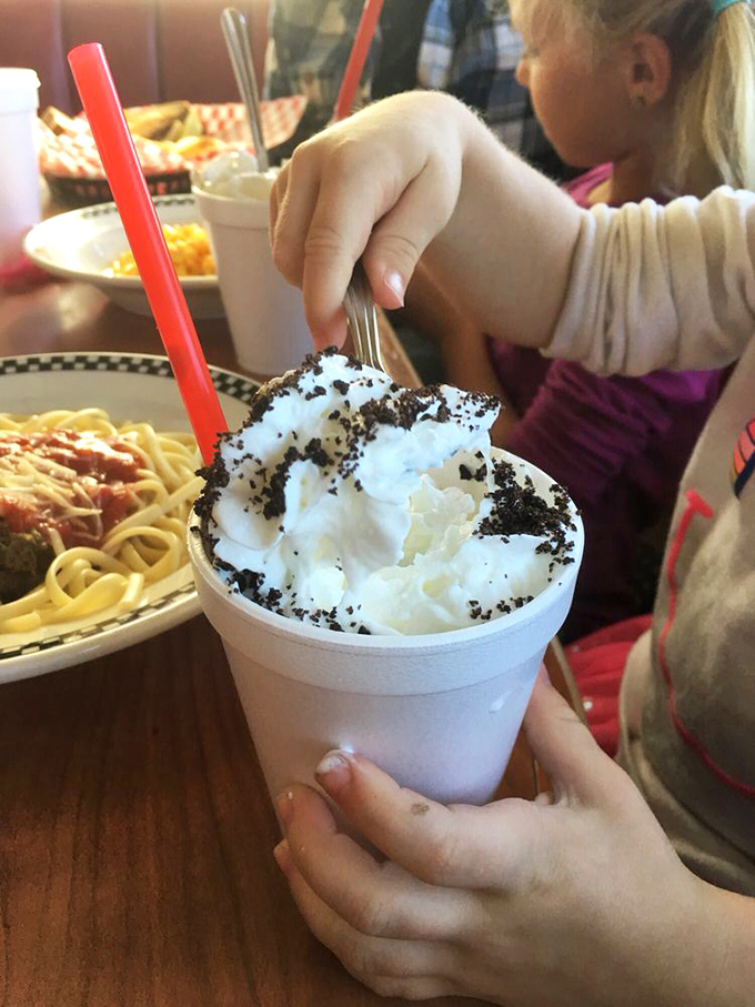 Kid in a candy store? More like kid in a milkshake paradise! This Oreo shake is taller than most toddlers and twice as sweet. Dentists, look away now.