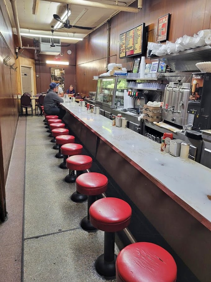 Pull up a stool and join the club. This lunch counter has seen more stories than a librarian on overtime.