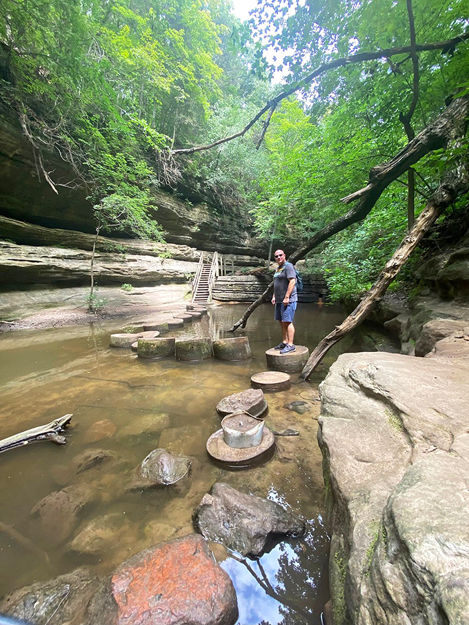 Stone-stepping your way to adventure! It's like nature's own game of "The Floor is Lava" - but wetter and more scenic.