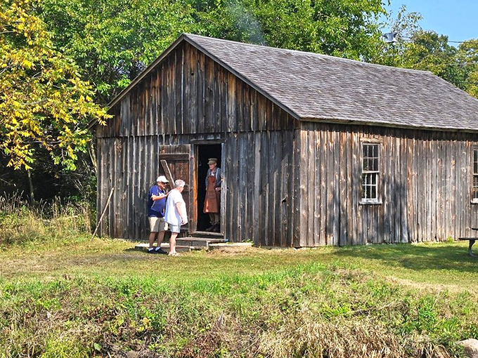 No DeLorean needed! These visitors are stepping right into a 19th-century time capsule, complete with authentic wood shavings.