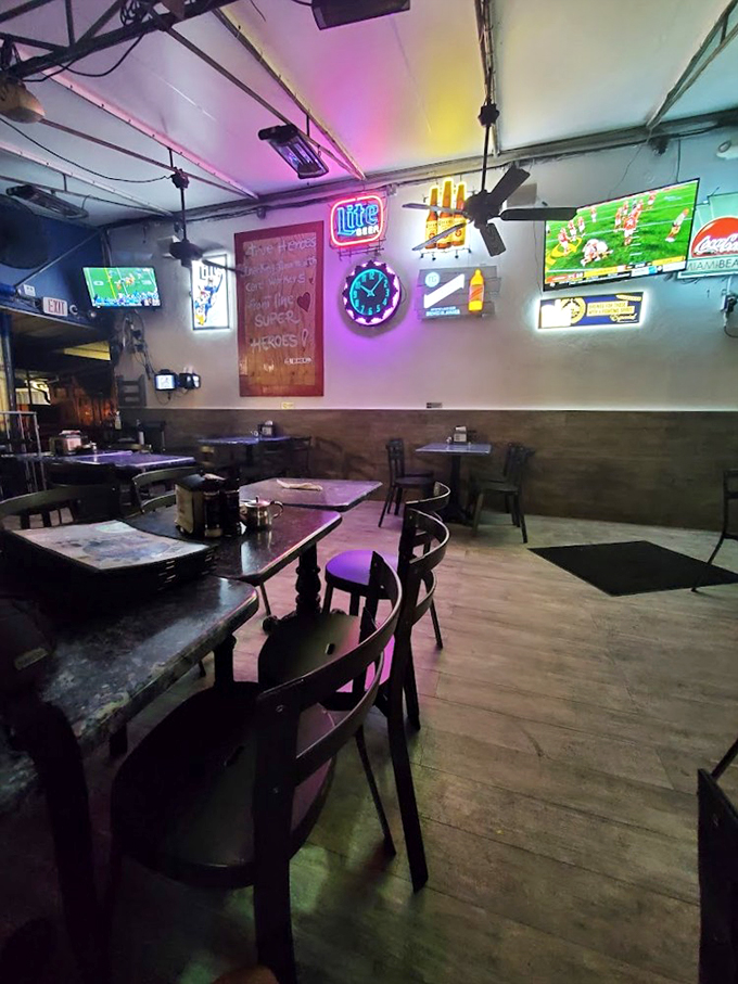 Welcome to Neon Nirvana! This wall's not just decor, it's a mood-lifting, retro-loving, Instagram-worthy slice of Americana. #DinerGoals