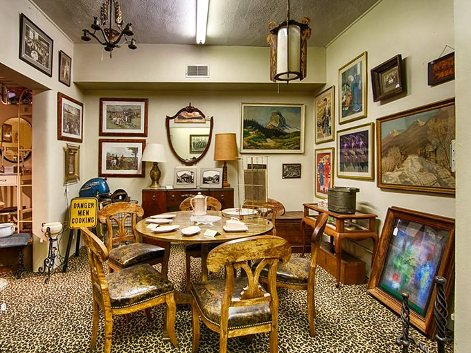 This eclectic art corner is where Picasso meets your eccentric aunt's living room. Who knew leopard print and landscapes could coexist so beautifully?