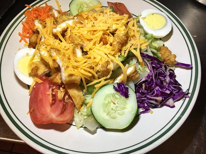 Who said salads can't be exciting? This chicken strip salad is like a party on a plate, with more colors than a Skittles commercial.