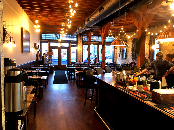 Dining area or time machine to a chic farmhouse? With string lights and rustic beams, it's the perfect backdrop for your next "I'm living my best life" post.