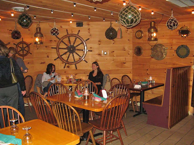 Ahoy, mateys! Welcome aboard the S.S. Delicious. This dining area is where nautical dreams and foodie fantasies collide in a whirlpool of wooden charm.