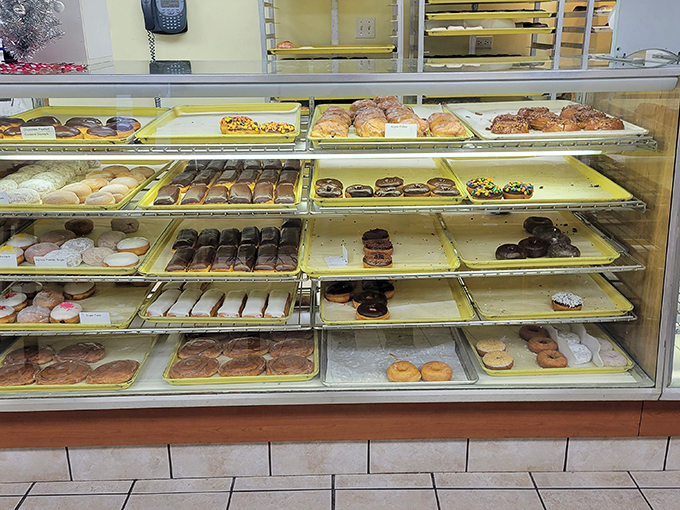 Sweet tooth's paradise! This display case is a treasure trove of temptation that would make even Mary Poppins forget about that spoonful of sugar.