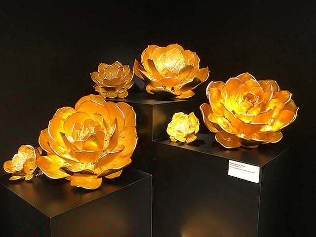 Nature's bling on display! These golden glass blooms are what I imagine King Midas's garden would look like. Talk about flower power!