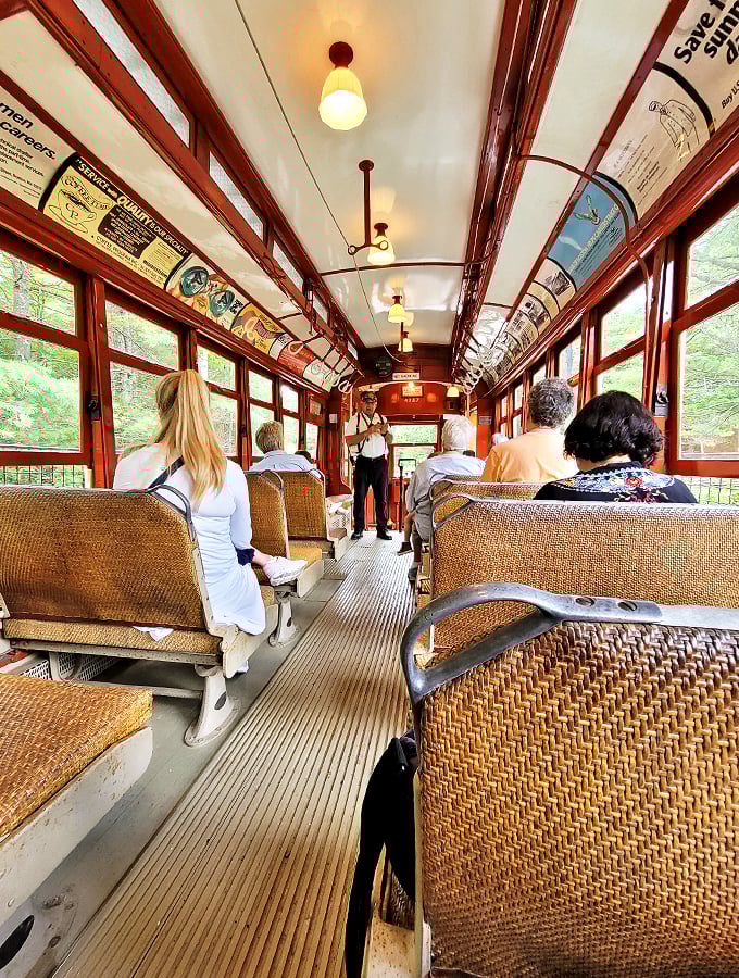 Step inside a moving time capsule! This trolley interior is so authentically vintage, you'll half expect to see Don Draper sipping an Old Fashioned.
