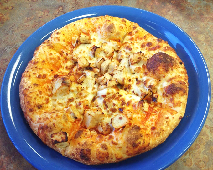 Who let the clucks out? This hot wing pizza is bringing the heat and the sweet. It's a party in your mouth, and everyone's invited! 