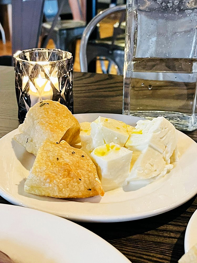 Fresh mozzarella, oh how I've missed you! This plate of creamy goodness is like a warm hug for your taste buds. Pair it with some crusty bread and prepare for cheese nirvana.