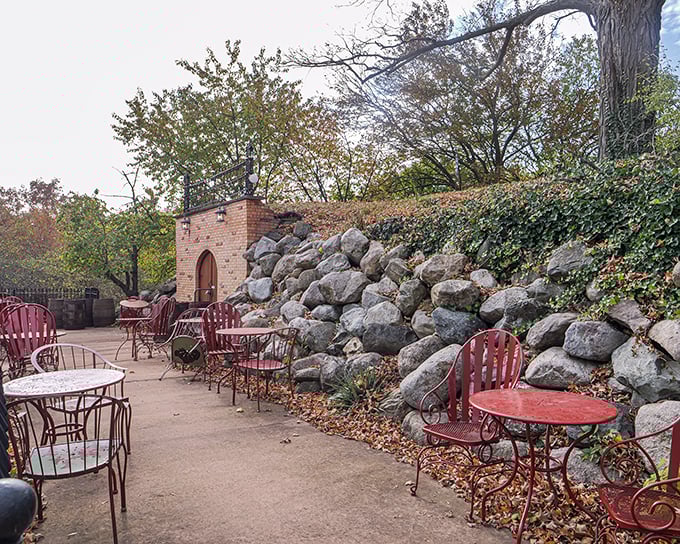 Al fresco dining with a side of history. These red chairs aren't just seats; they're time machines to a more relaxed era.