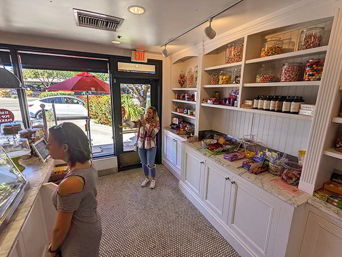 Candy jars lined up like soldiers, ready to march straight into your ice cream. Resistance is futile!