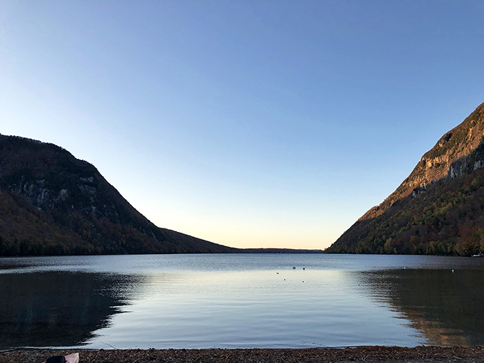 Fifty shades of green, with a splash of blue. Lake Willoughby nestles between mountains like nature's own infinity pool.