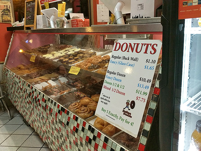 Donuts, donuts everywhere, and every bite a treat. This display case is the stuff of sweet dreams.