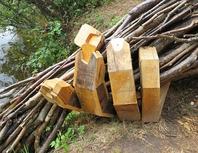 High five or low five? Benny's hand reaches out, inviting visitors to connect with nature in the most fantastical way.