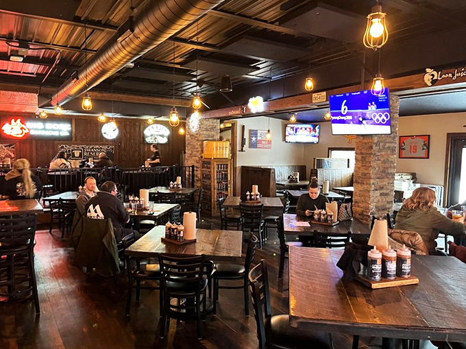 Where smoke meets style. This inviting space is a barbecue lover's playground, complete with neon signs that could make Vegas jealous.