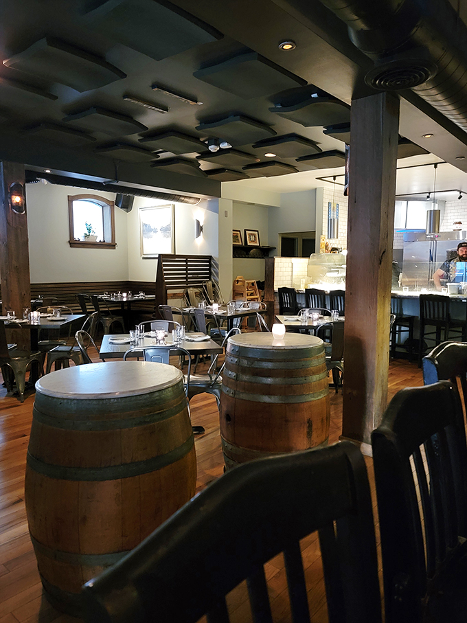 Cozy corners and wine barrels galore! This interior feels like a warm Italian hug, with a side of Vermont charm. Is it too soon to call dibs on that corner table?