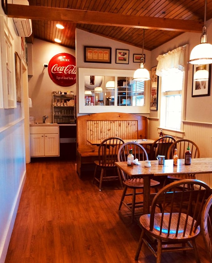 Rustic charm meets modern comfort in this dining area. It's like eating in your grandma's kitchen, if grandma had really cool taste in lighting.