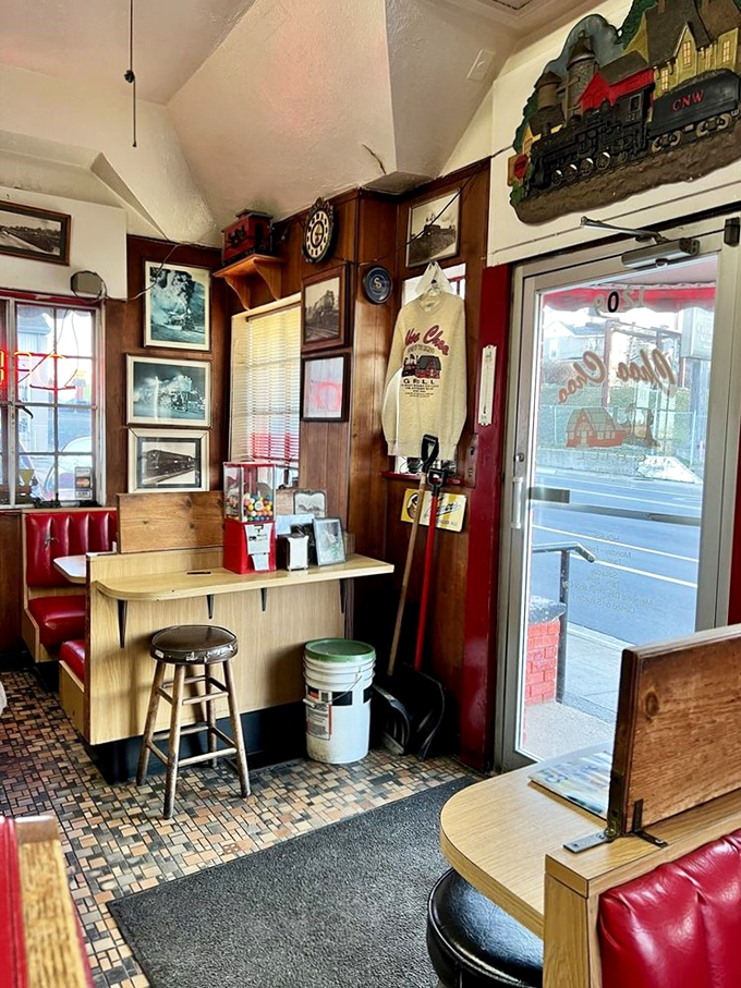 Every inch tells a story in this cozy corner. It's like your cool uncle's den, if your uncle collected train memorabilia and served amazing burgers.