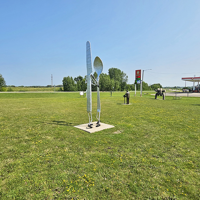 Hungry for art? Vining serves up a heaping helping of whimsy with this giant utensil duo. Fork-get your diet, it's time to dig in!