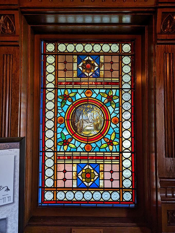 Stained glass that's a class act! This window's got more colors than a bag of Skittles, but way more sophisticated.