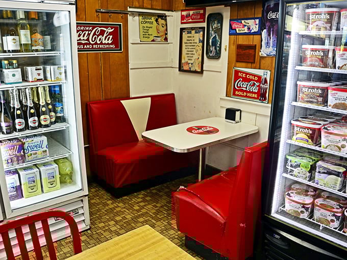 Nostalgia served with a side of Coca-Cola. This retro booth is like a portal to simpler times and sweeter treats.