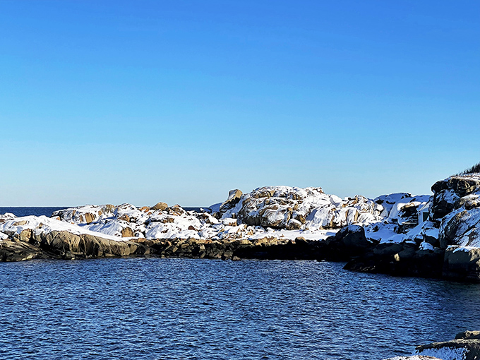 Winter's icy grip transforms the coast into a frosty wonderland. It's like nature hit the pause button and sprinkled everything with sugar.