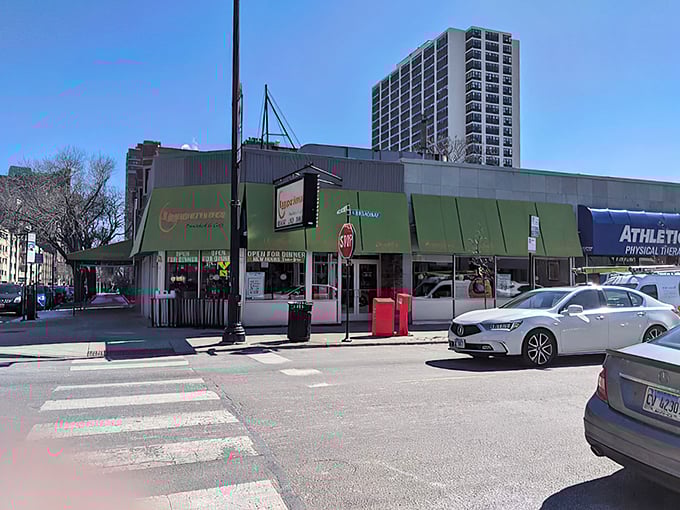 Egg-cellent adventures await! This green-awning wonder is where breakfast dreams take flight.