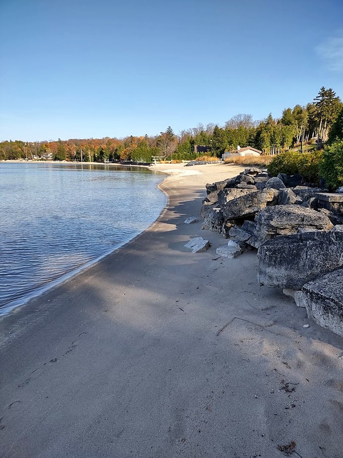 Door County's hidden gem: Egg Harbor's beach invites you to dip your toes in waters that rival the Mediterranean (just a tad cooler).