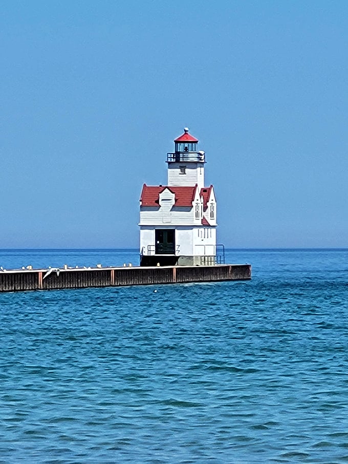 Roadtrippers, follow the red brick road... or in this case, the red lighthouse at the end of the pier!