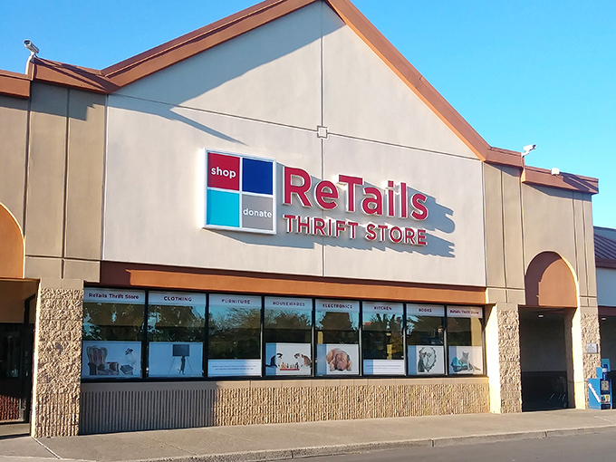 ReTails Thrift Store's welcoming storefront features adorable pet photos, setting the tone for a shopping adventure that helps our four-legged friends.