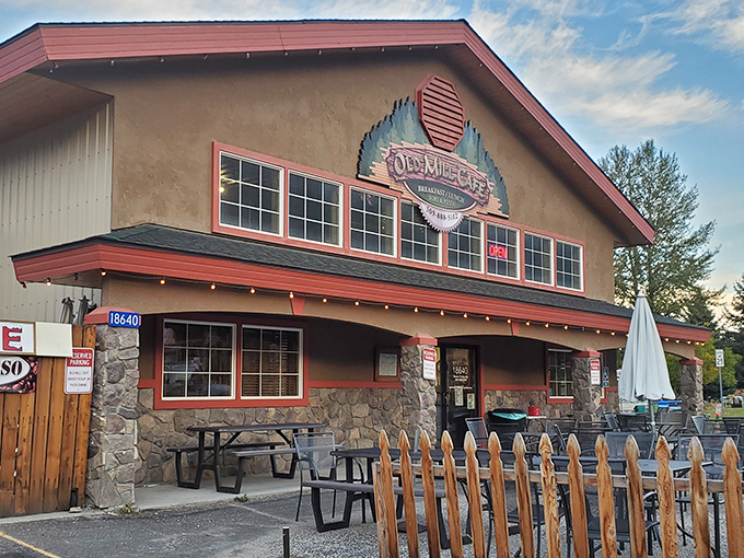 Welcome to the Old Mill Cafe, where rustic charm meets culinary magic. This cozy log cabin-style eatery promises a feast for both your eyes and taste buds!