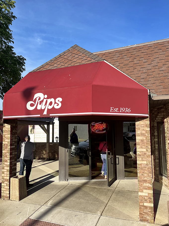 Welcome to chicken paradise! Rip's iconic red awning beckons like a beacon of crispy, golden hope to hungry souls far and wide.