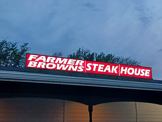 Welcome to beef paradise! Farmer Brown's Steak House stands proud against the Nebraska sky, promising a carnivore's dream come true.