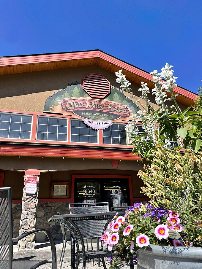 Welcome to the Old Mill Cafe, where rustic charm meets culinary magic. This cozy log cabin-style eatery promises a feast for both your eyes and taste buds!