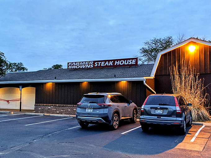 Welcome to beef paradise! Farmer Brown's Steak House stands proud against the Nebraska sky, promising a carnivore's dream come true.