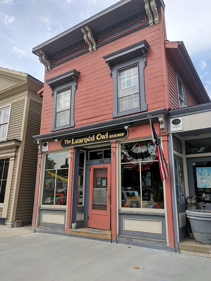 A literary oasis in salmon pink! The Learned Owl's charming facade promises adventures within, no library card required.