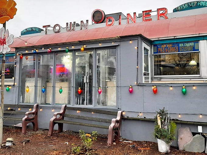 A neon-lit time machine! This classic diner exterior promises a journey back to when breakfast was king and calories were just a twinkle in your doctor's eye.