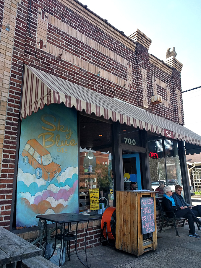A brick facade with a whimsical mural? Sky Blue Cafe's exterior is like a warm hug for your eyeballs!