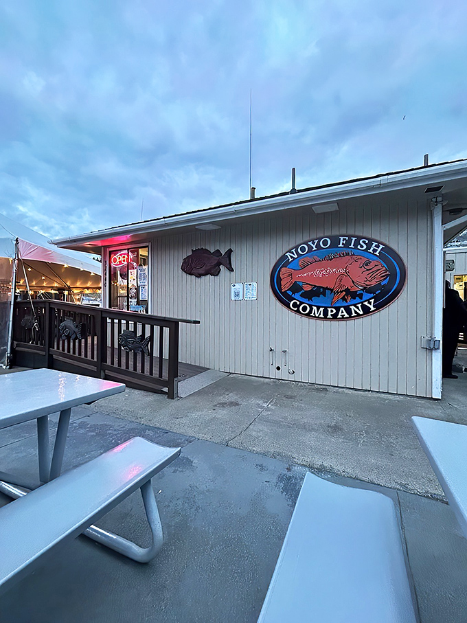 Welcome to seafood paradise! Noyo Fish Company's exterior promises a feast for the senses, with its charming weathered siding and eye-catching signage.