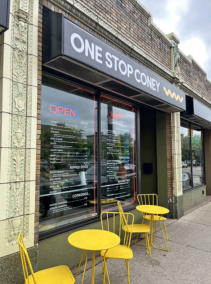 Neon dreams and comfort food schemes! One Stop Coney Shop's storefront glows like a beacon for hungry souls in Grand Rapids.