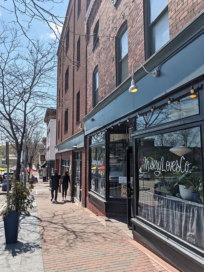 Misery loves company, and apparently, so does this charming storefront! Winooski's culinary gem beckons with its inviting facade and promise of comfort food delights.