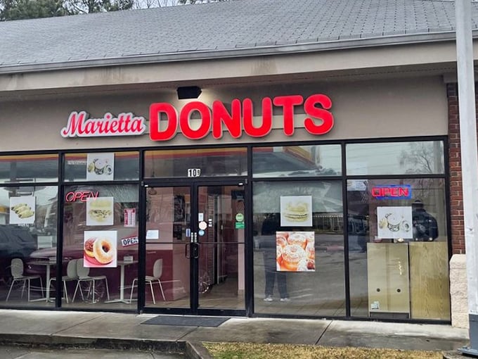 Welcome to donut paradise! Marietta Donuts' storefront promises a sugar-coated adventure that'll make your taste buds do a happy dance.