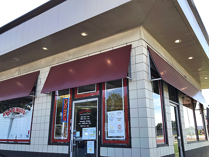 Welcome to donut paradise! Avon Donuts' cheery red awnings beckon like a siren song to sweet-toothed sailors navigating the streets of Pontiac.