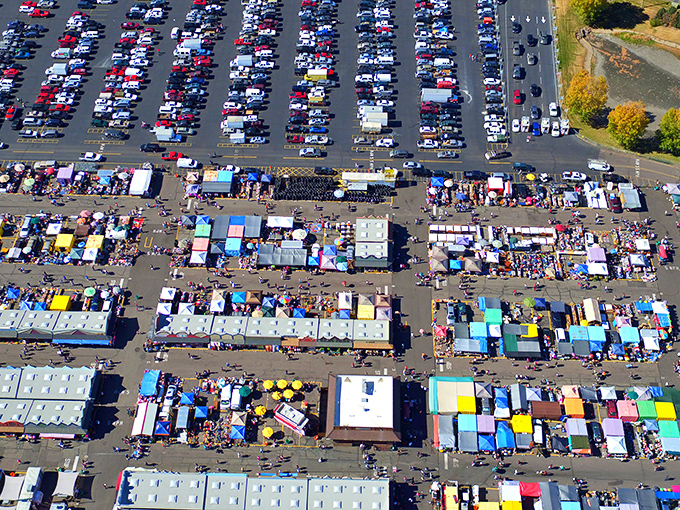 A kaleidoscope of tents, treasures, and bargain hunters sprawls across the Mile High Flea Market. From above, it's a vibrant patchwork of colors, crowds, and countless possibilities for the perfect find.