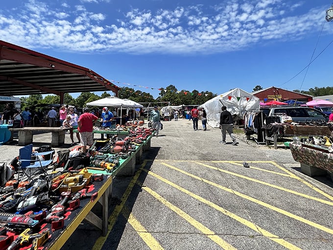 Welcome to bargain hunter's paradise! Smiley's Flea Market greets you with a rainbow of flags and promises of treasures waiting to be discovered.