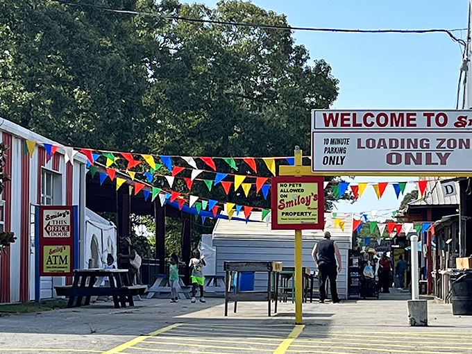 Welcome to bargain hunter's paradise! Smiley's Flea Market greets you with a rainbow of flags and promises of treasures waiting to be discovered.