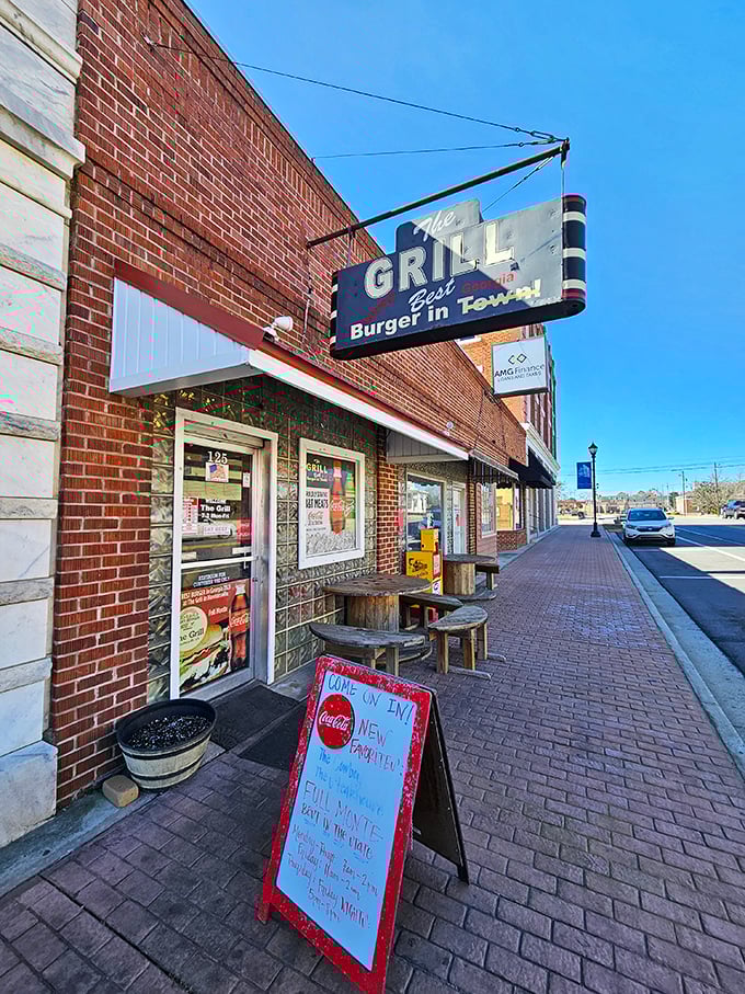 Welcome to burger paradise! The Grill's vintage sign promises the "Best Burger in Town," and boy, does it deliver on that mouthwatering pledge.
