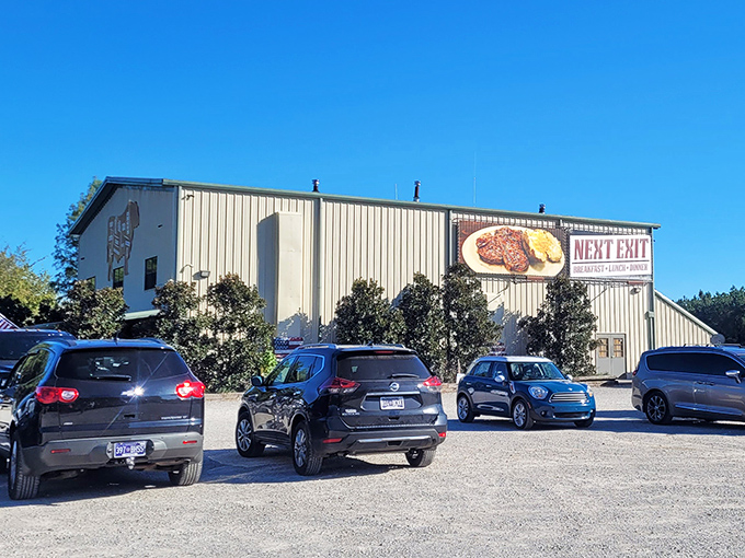 Next Exit: Flavor Town!" This unassuming exterior hides a carnivore's paradise. Who knew steak heaven was just off the highway?