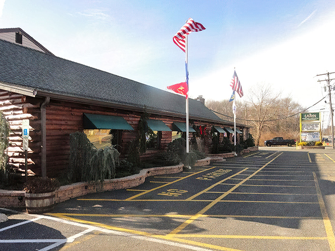 A cabin in the woods? Nope, it's The Cabin Restaurant, where culinary adventures await. This rustic exterior hints at the cozy charm and mouthwatering delights inside.